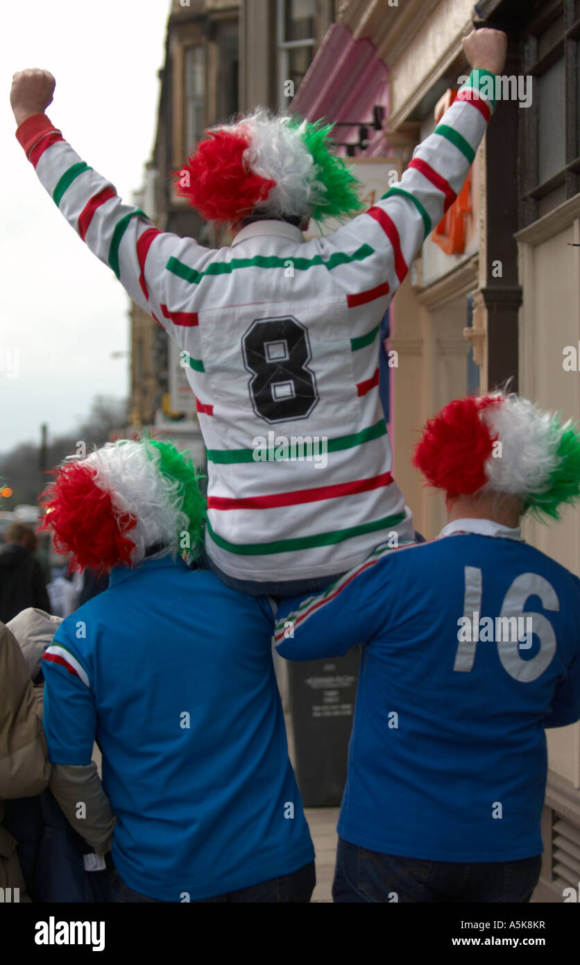 Italy rugby fans wearing shirts and wigs in italian flag colours Stock ...