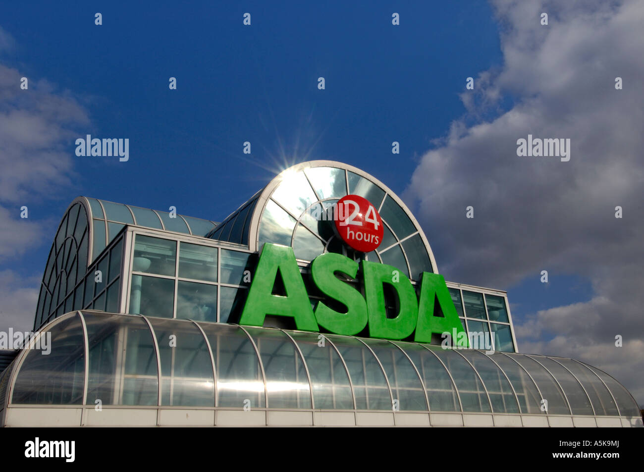 The glass roof of a new 24 hour opening ASDA supermarket Stock Photo ...