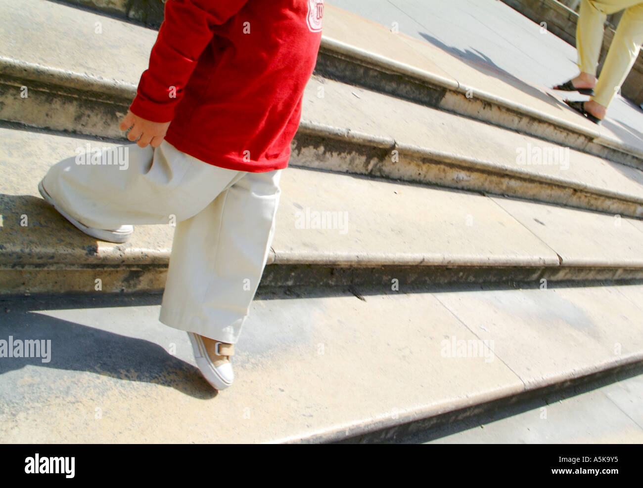Child walking upstairs Stock Photo - Alamy