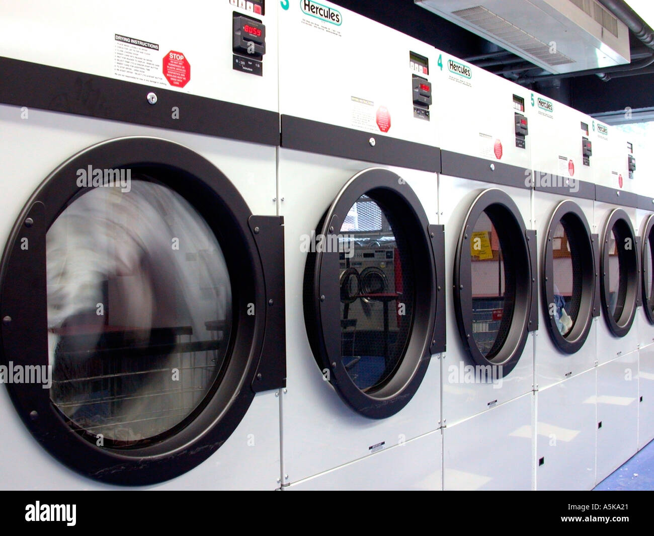 Dryer in a laundry room Stock Photo - Alamy