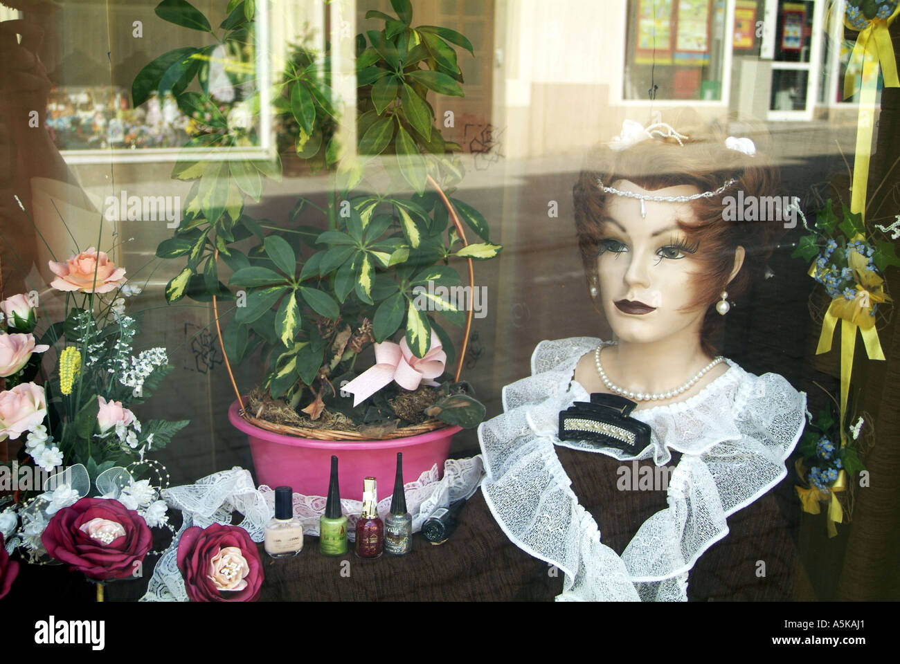 Eastgermany, GER, Germany: Oldfashioned shop window with a puppet Stock ...