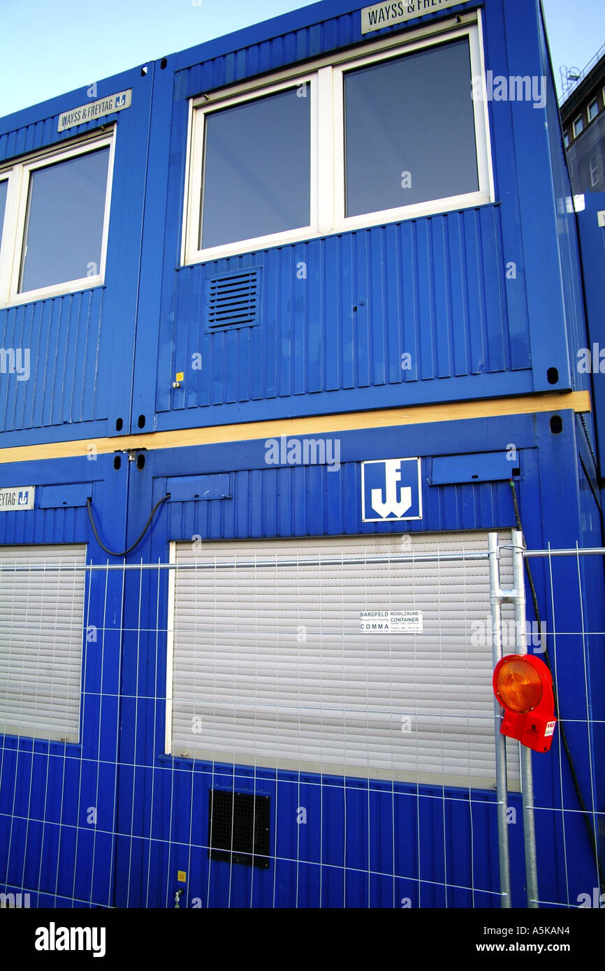 Blue housing container on a building site Stock Photo - Alamy