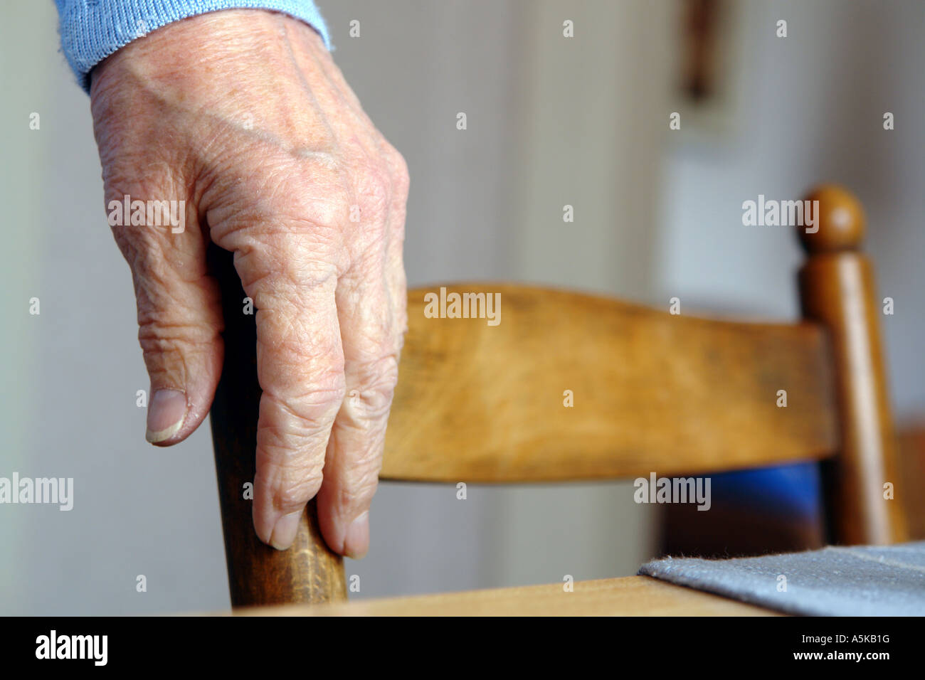 Hand old woman on chair hi-res stock photography and images - Alamy