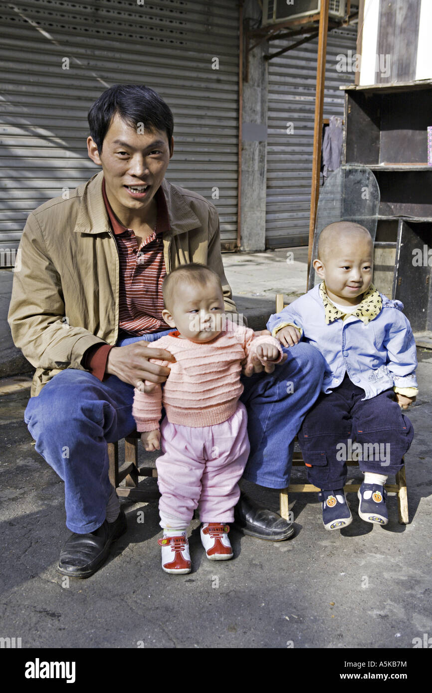 CHINA SHANGHAI Chinese father proudly shows off his baby daughter and ...