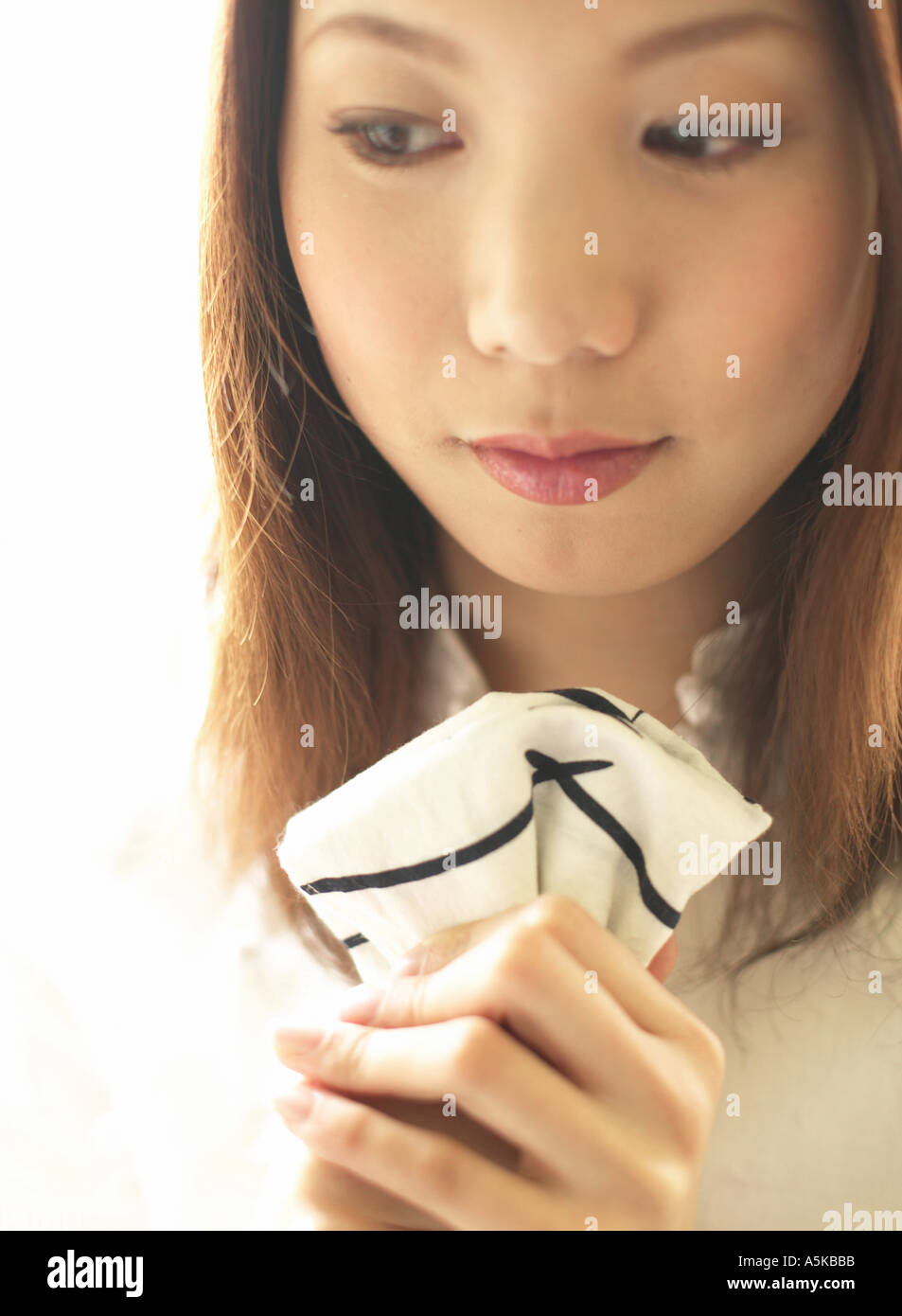 Holding a handkerchief hi-res stock photography and images - Alamy