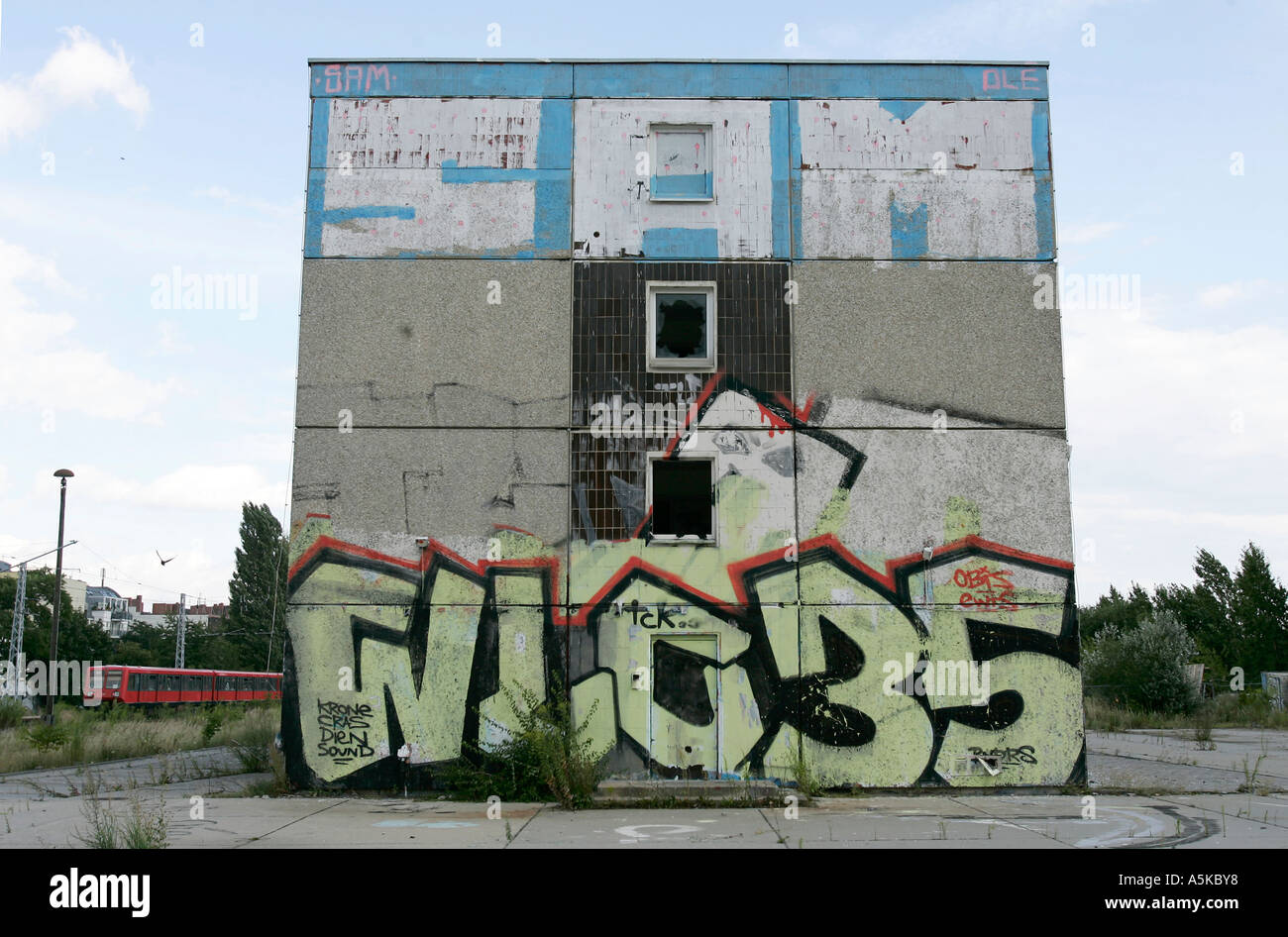Empty block of flats with graffitos on it in East Berlin Stock Photo ...