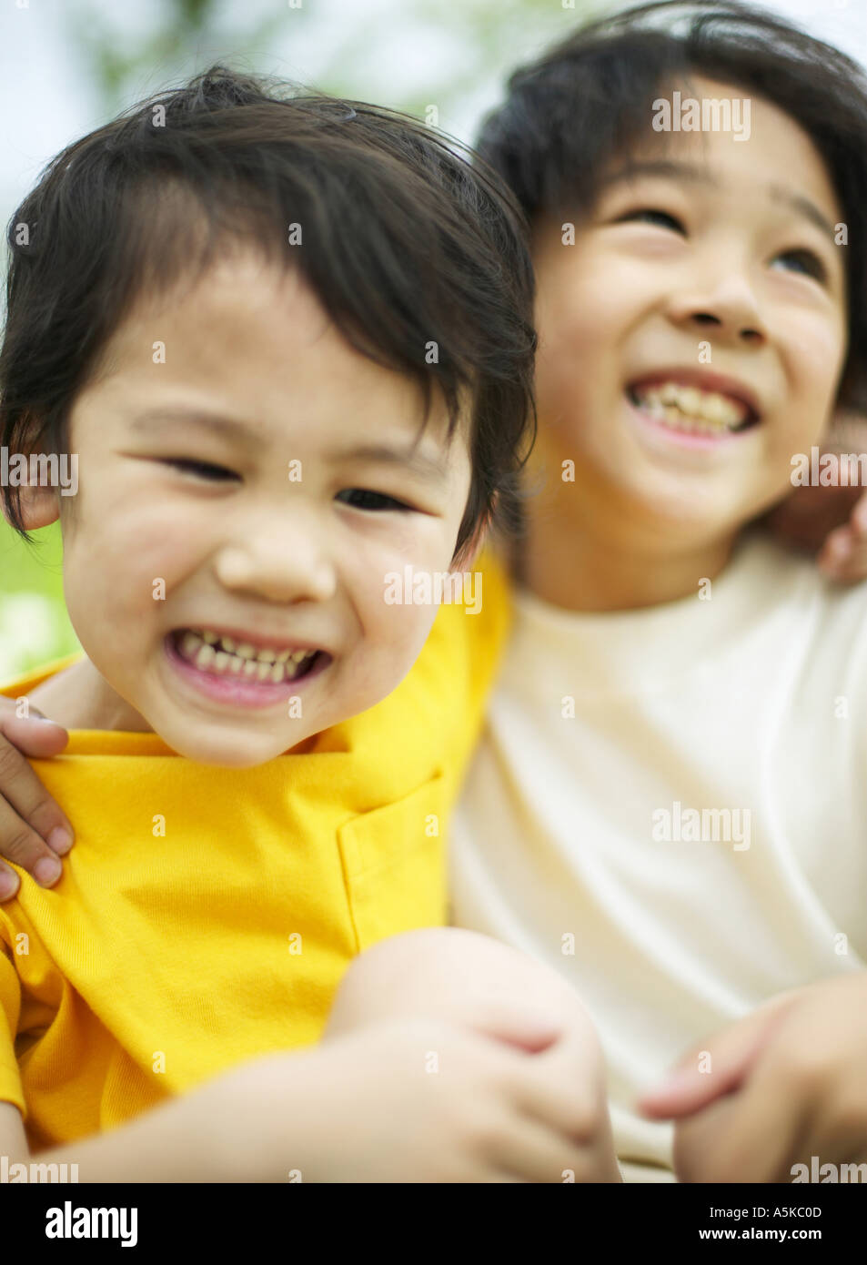 Arm around each other and boys hi-res stock photography and images - Alamy