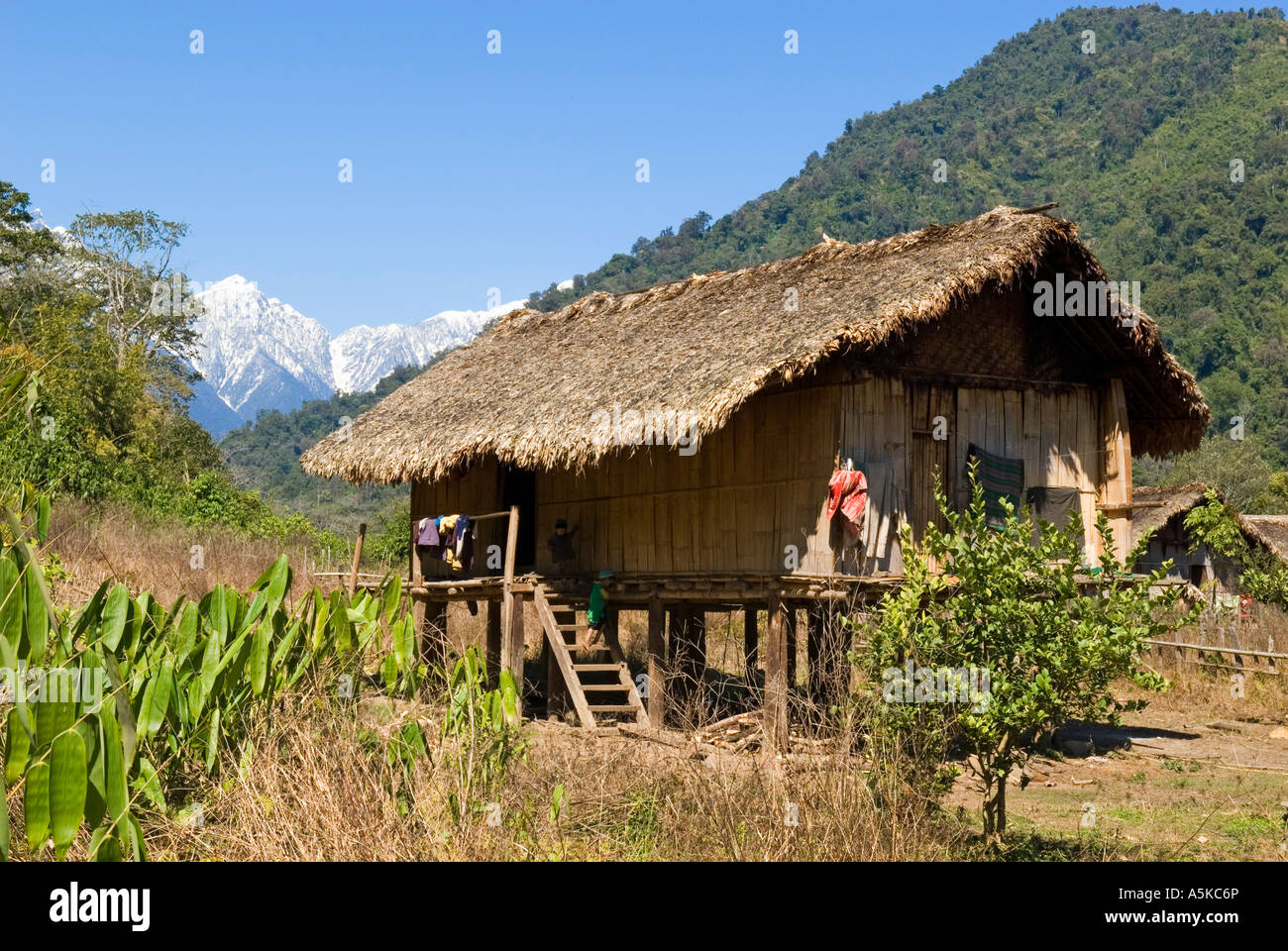 Traditional Rawang house in the Phon Kan Razi area, Kachin State ...