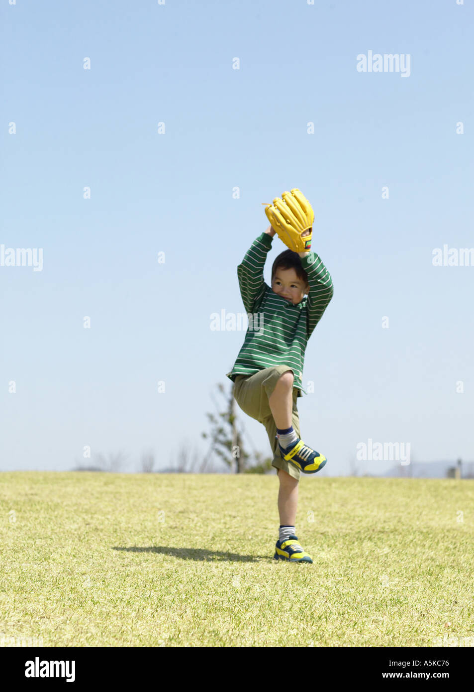 Asian boy playing baseball hi-res stock photography and images - Alamy