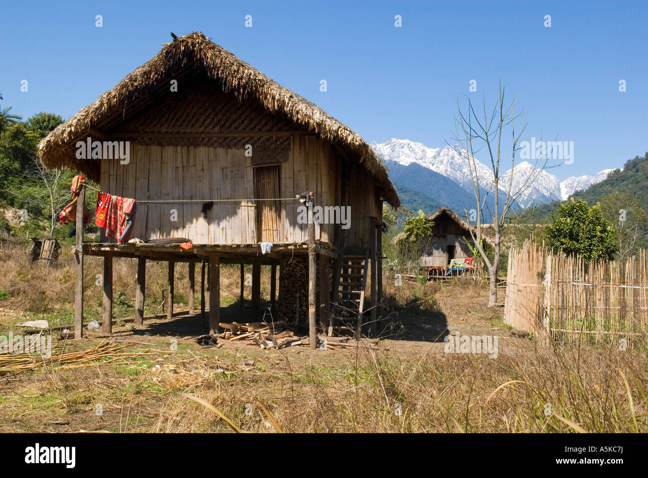 Traditional Rawang house in the Phon Kan Razi area, Kachin State ...