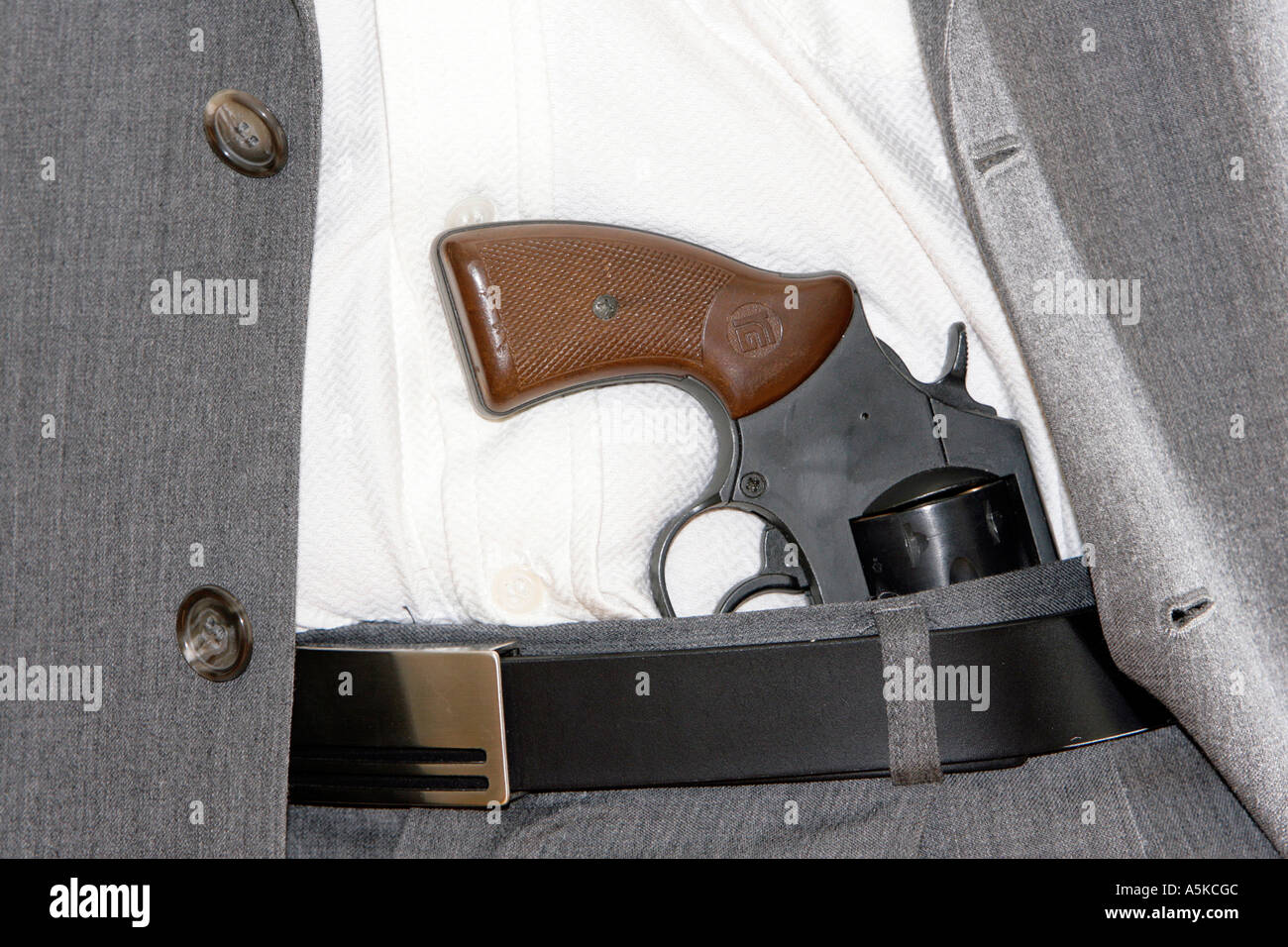 Gun is held by a belt Stock Photo - Alamy