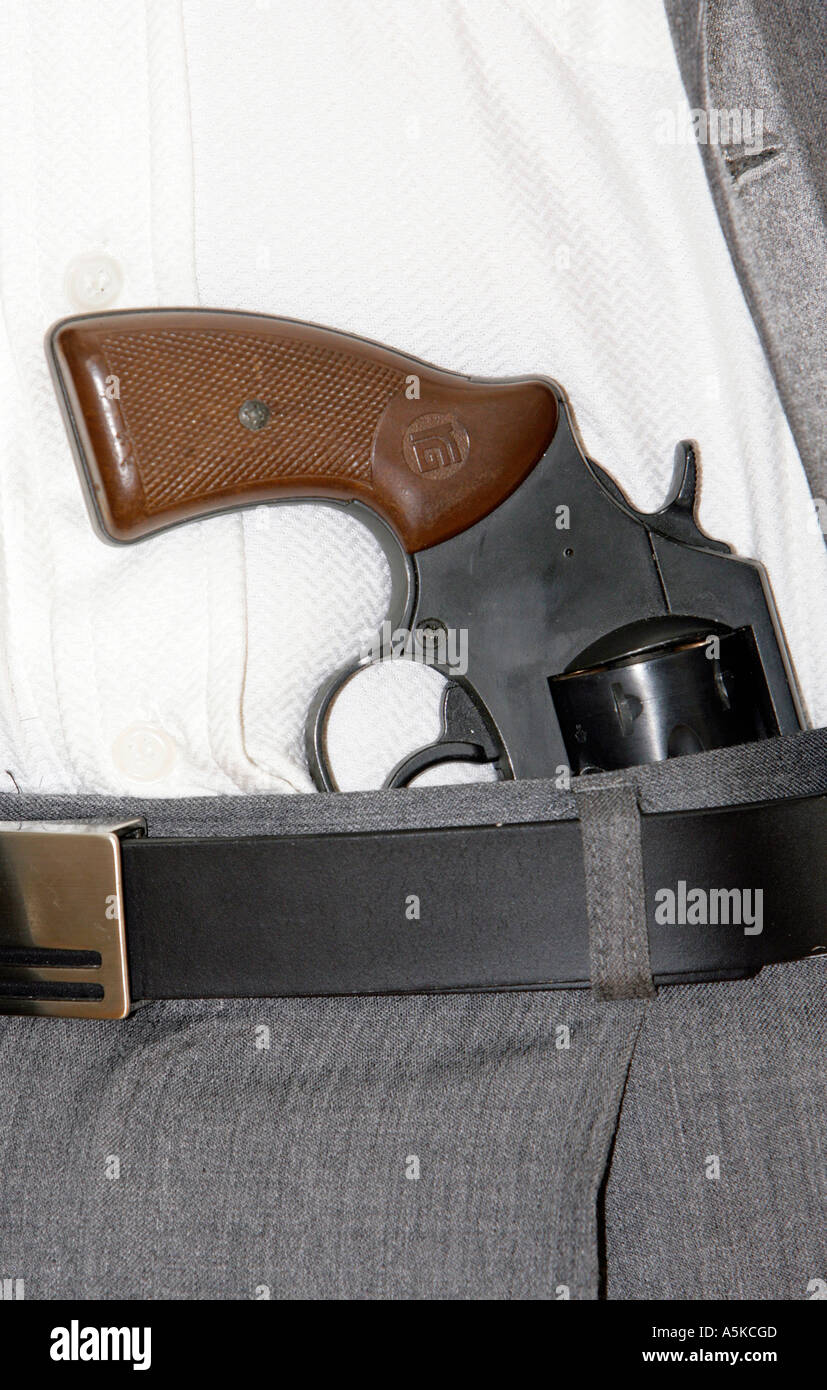 Gun is held by a belt Stock Photo - Alamy
