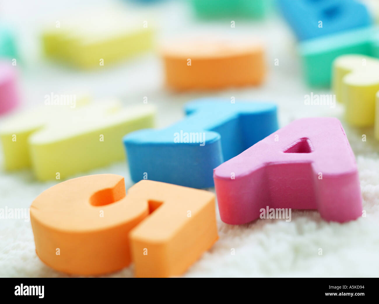 Toy numbers and alphabets Stock Photo - Alamy