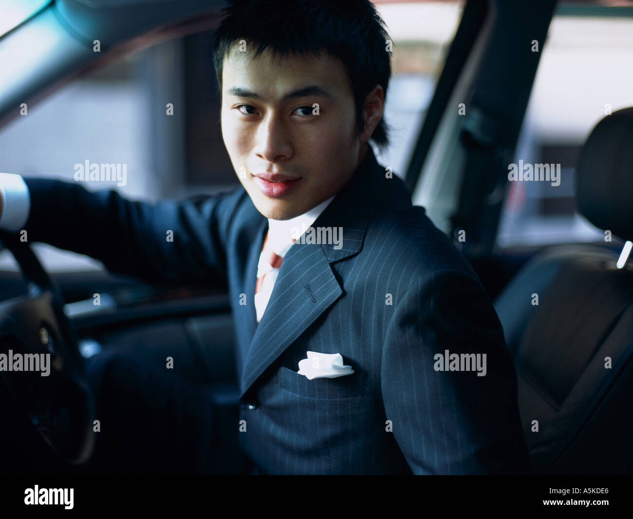 Smiling asian man driver japanese hi-res stock photography and images ...