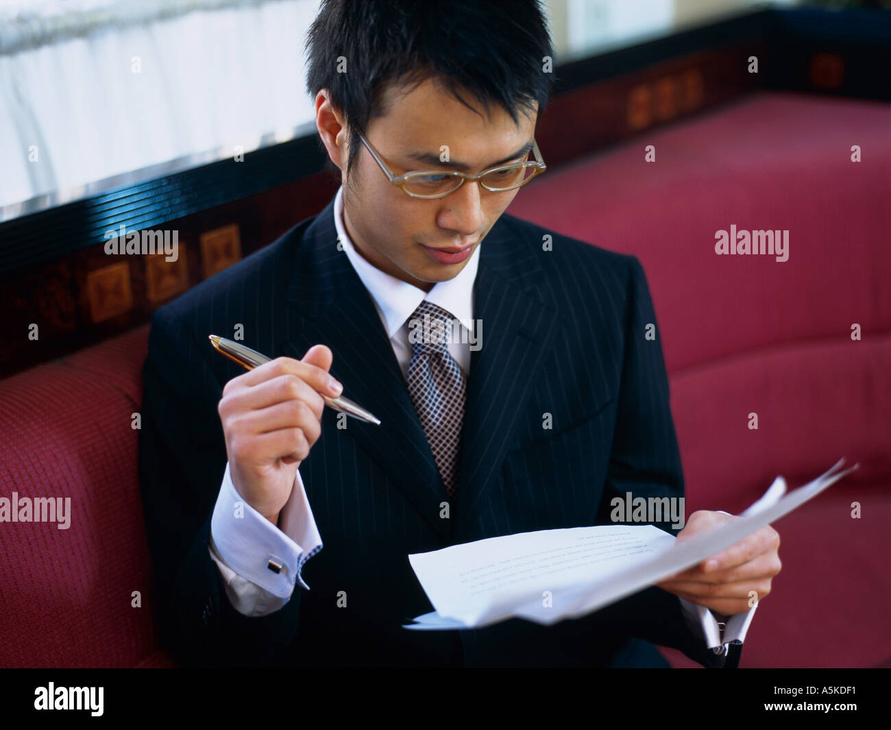 Checking paperwork hi-res stock photography and images - Alamy