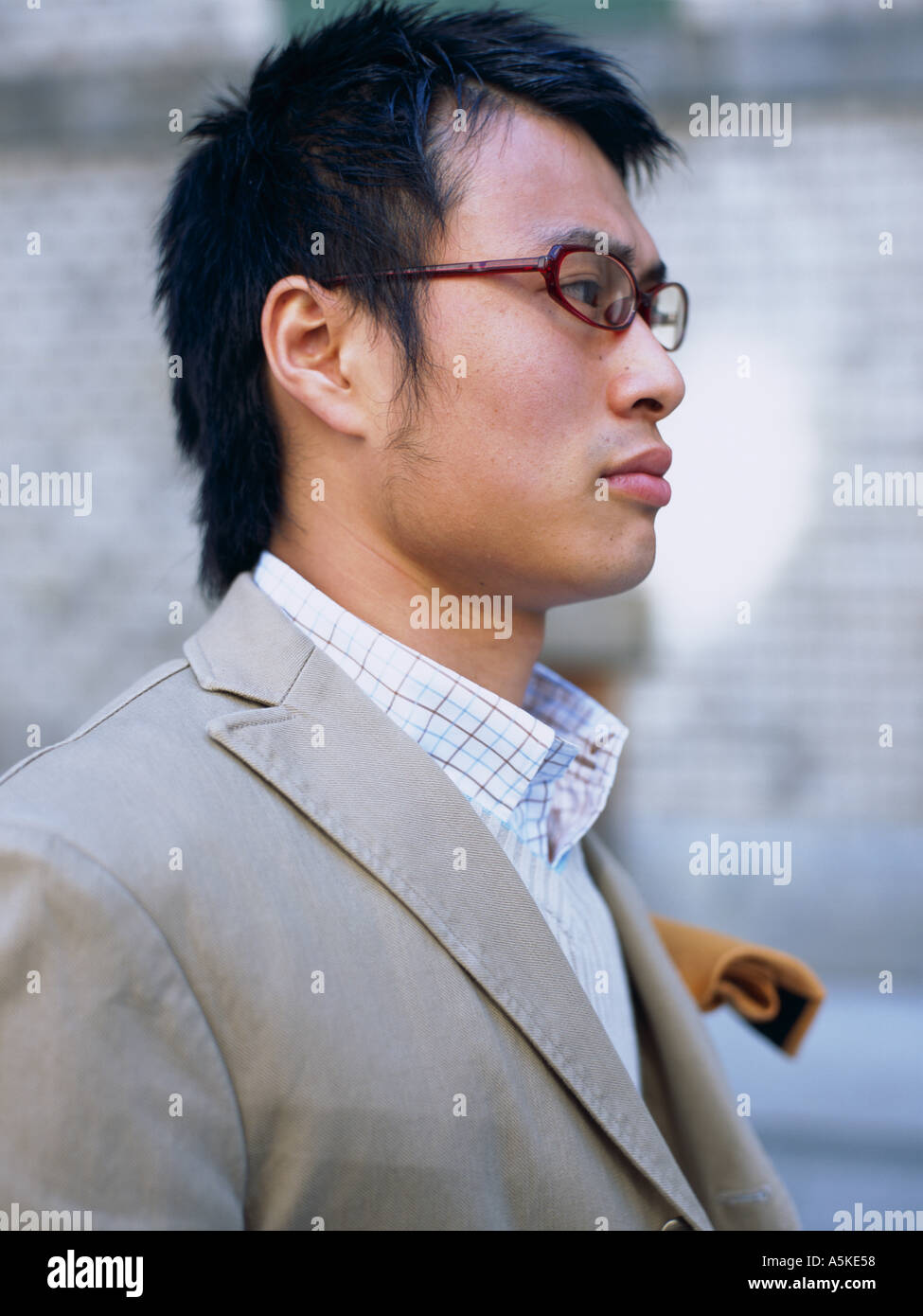 Side profile of a Asian Man Stock Photo - Alamy