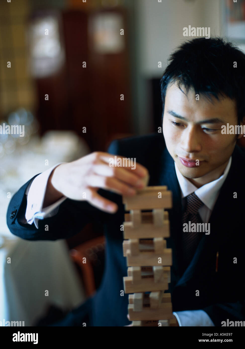 Businessman playing blocks hi-res stock photography and images - Alamy