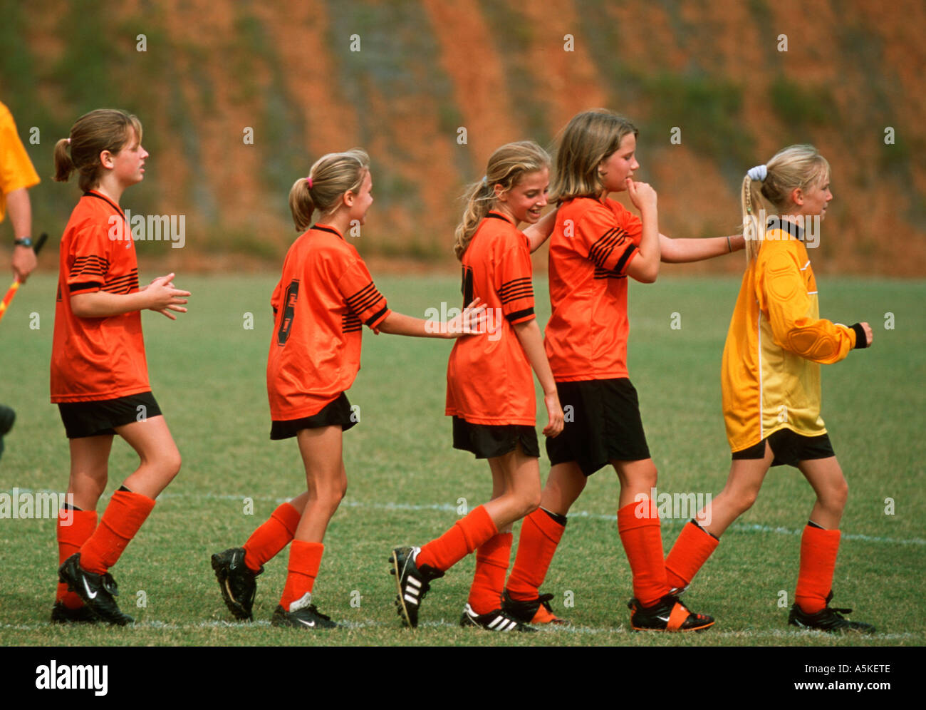 Girls wearing team uniforms hi-res stock photography and images - Alamy