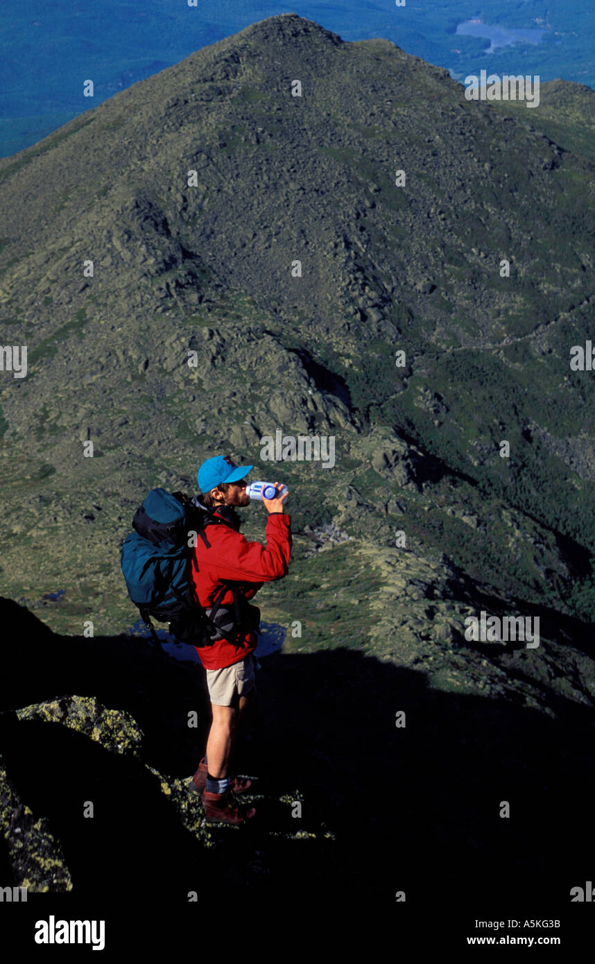 Hiker on Mt Adams looks at Mt Madison and the Parapet Trail White ...