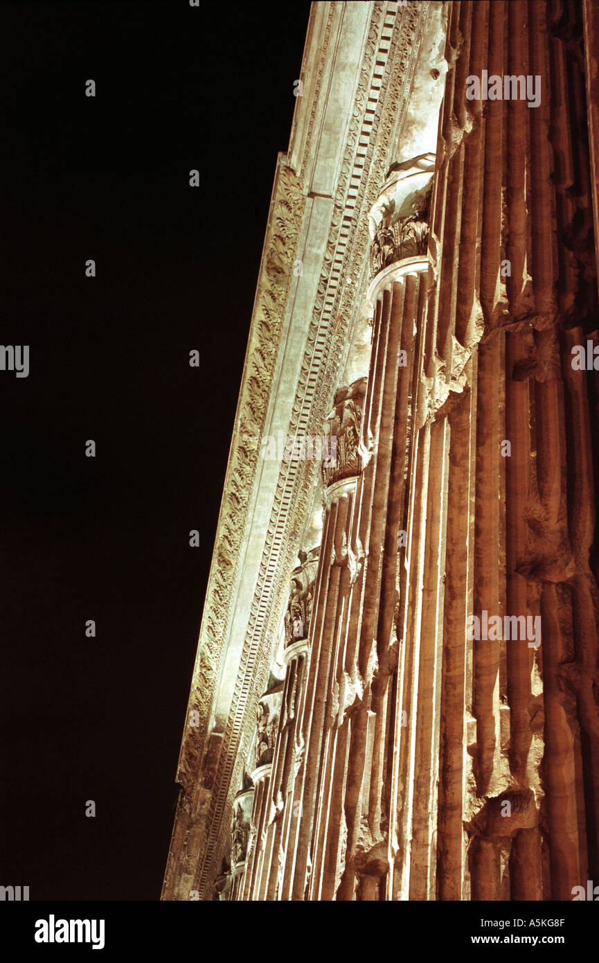 roman temple with columns lit at night rome Stock Photo - Alamy