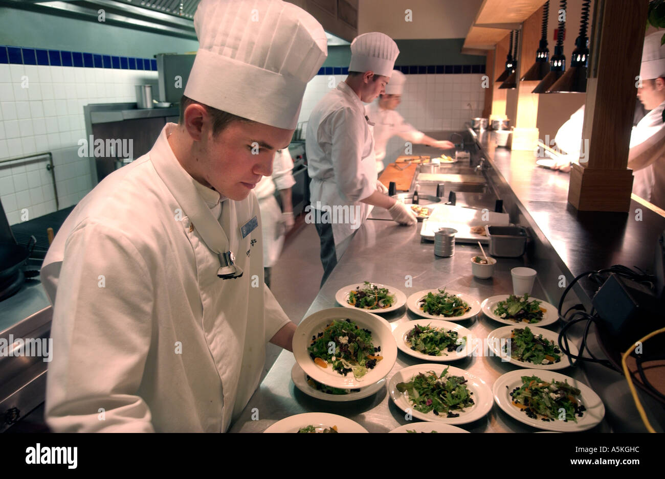 Chef line chef student with salads Training for career Stock Photo - Alamy