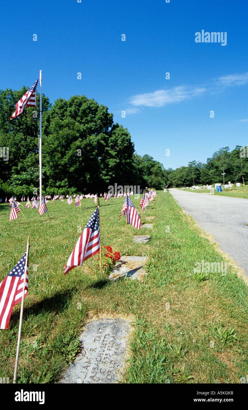 A group of American Flags in an scenic New England graveyard Stock ...