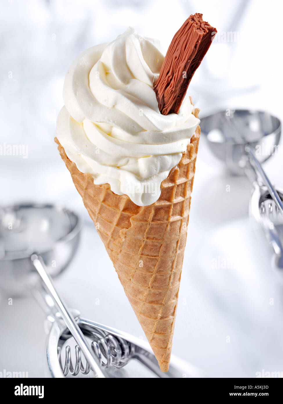 VANILLA ICE CREAM CONE WITH CHOCOLATE Stock Photo - Alamy