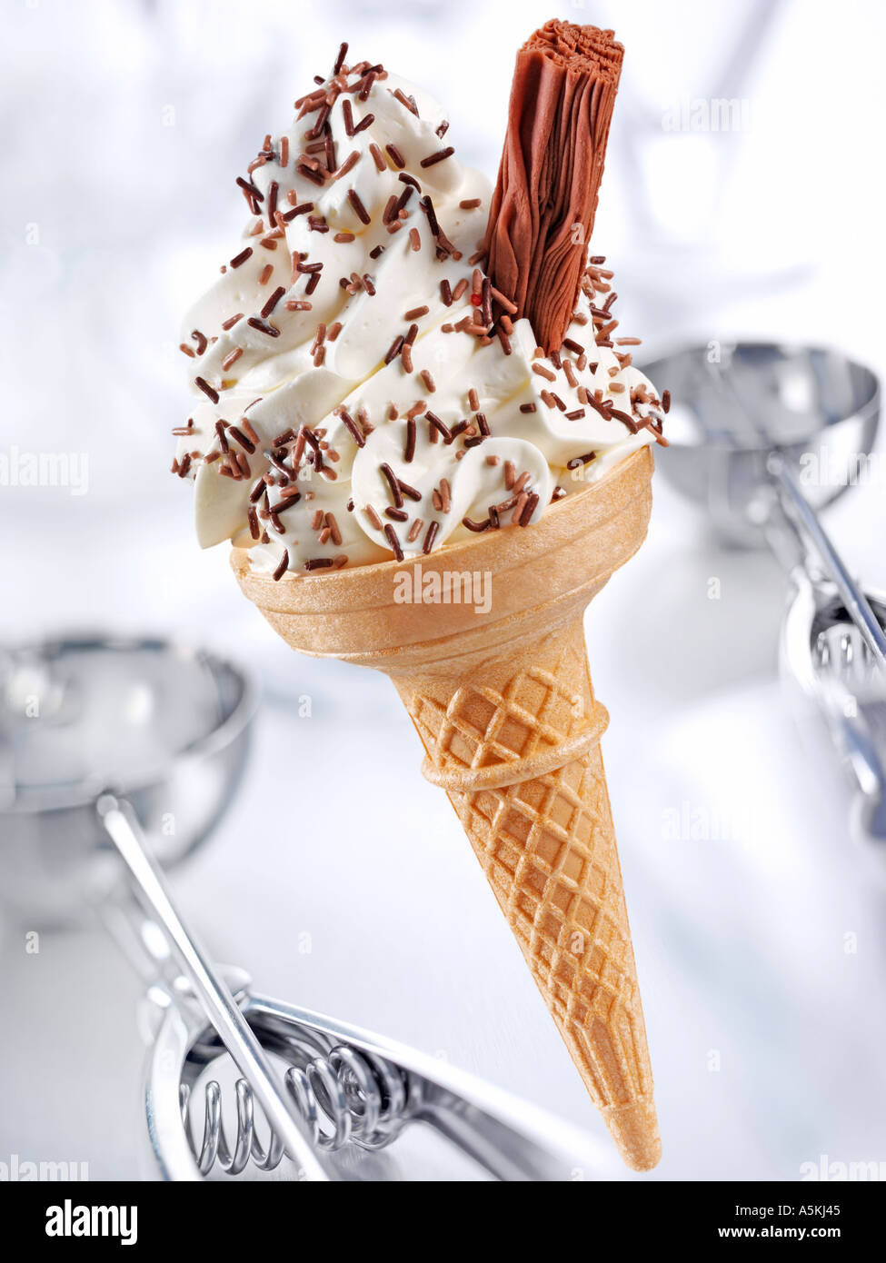 VANILLA ICE CREAM CONE WITH CHOCOLATE Stock Photo - Alamy