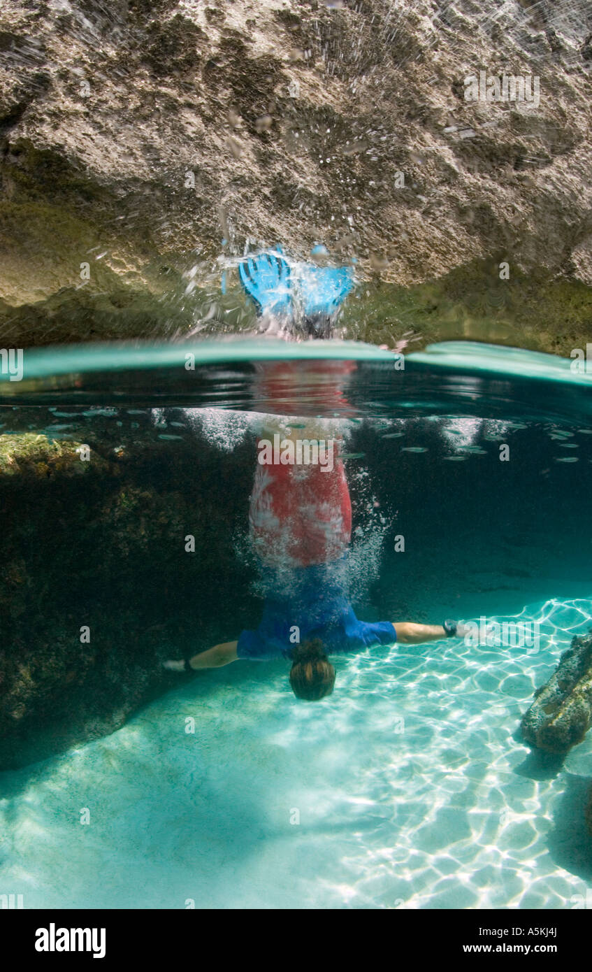 Under over image at Swimming Hole Muertos Cay Cay Sal Bank Bahamas ...