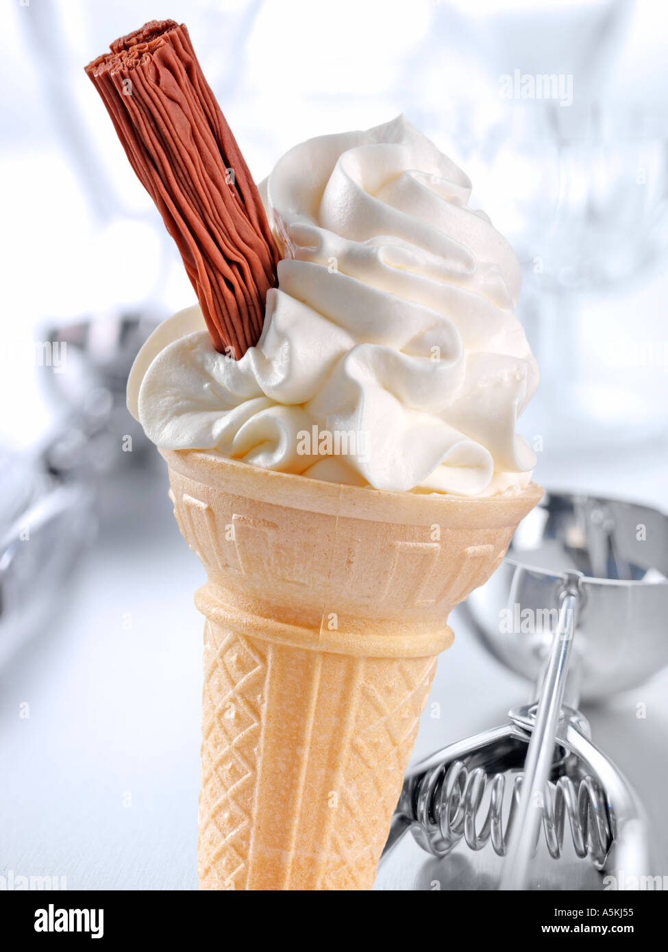 VANILLA ICE CREAM CONE WITH CHOCOLATE Stock Photo - Alamy