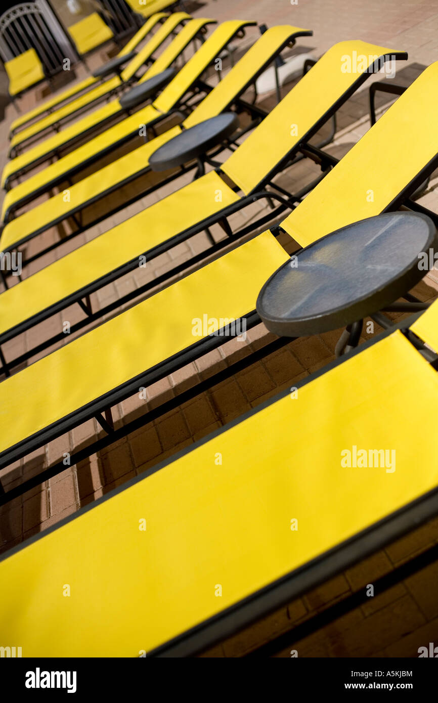 Yellow lawnchairs on pool deck of hotel on oceanfront Virginia Beach VA ...