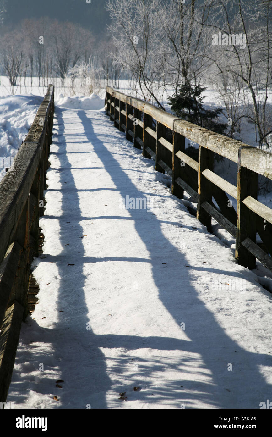Walking bridge with snow Stock Photo - Alamy