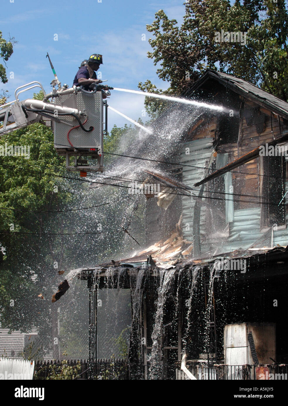 Fireman hose and ladder hi-res stock photography and images - Alamy