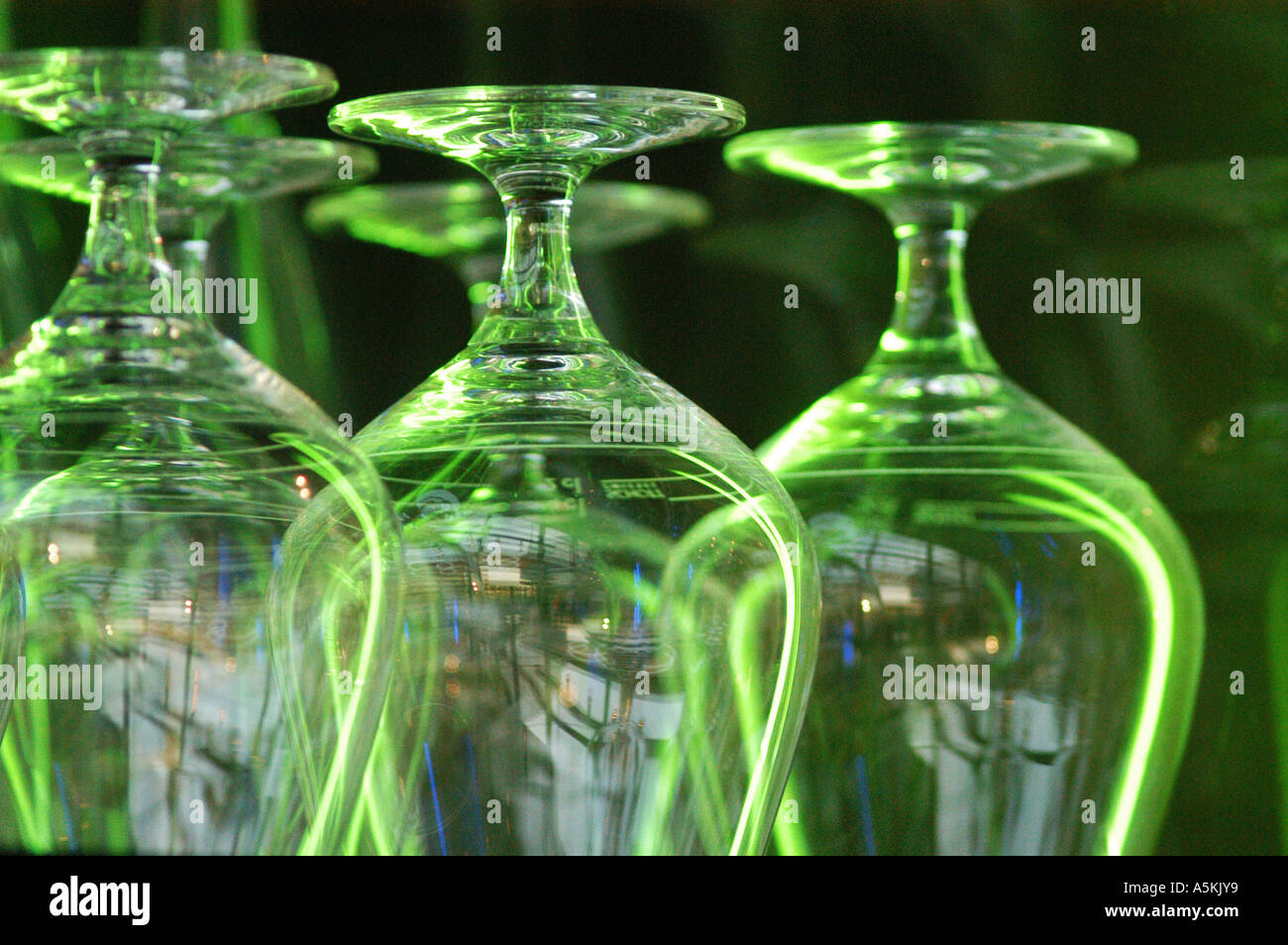 glasses in green light Stock Photo - Alamy