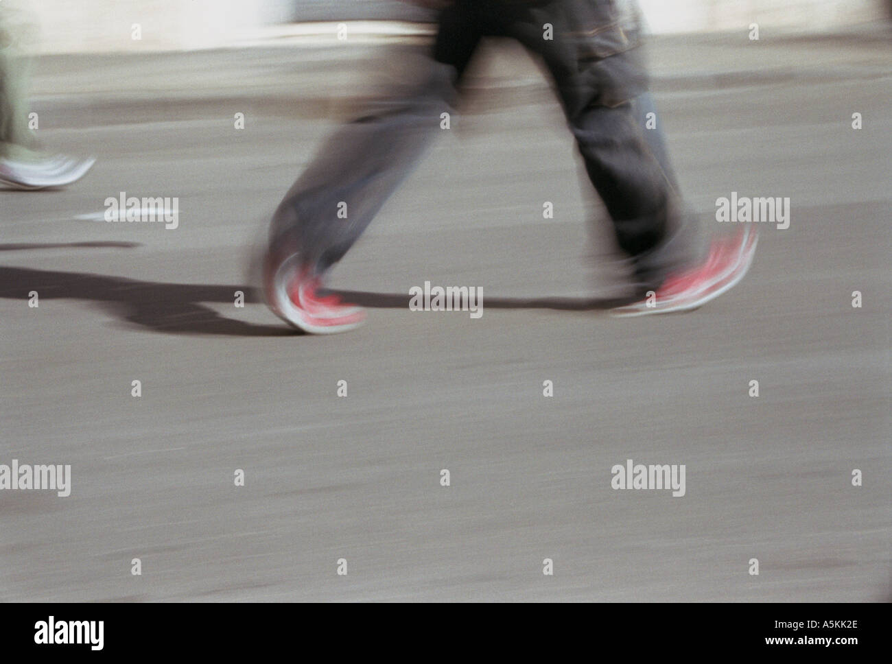 commuter s legs passing by quickly blur Stock Photo - Alamy