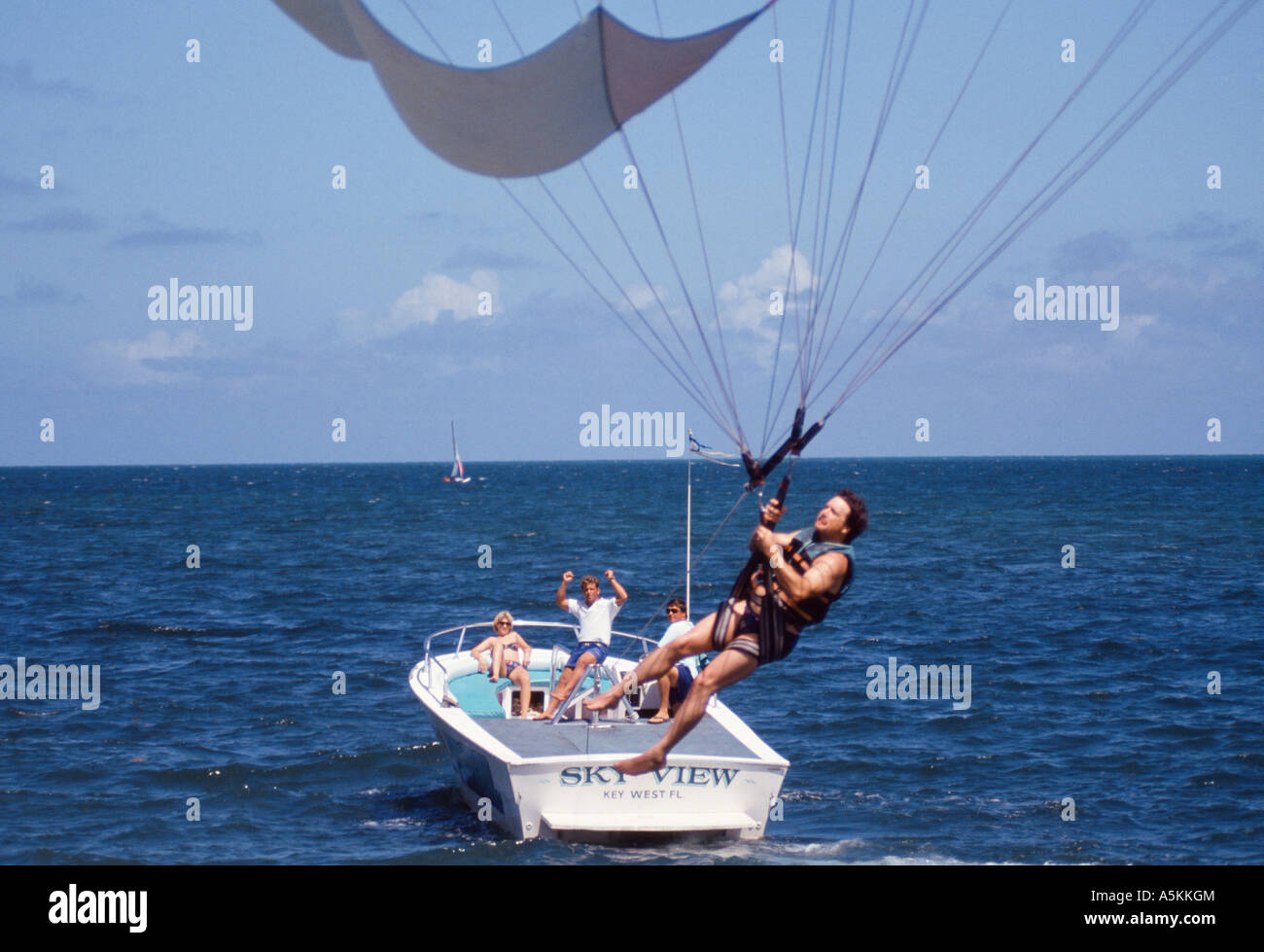 FL Key West parasail and tow boat Stock Photo - Alamy