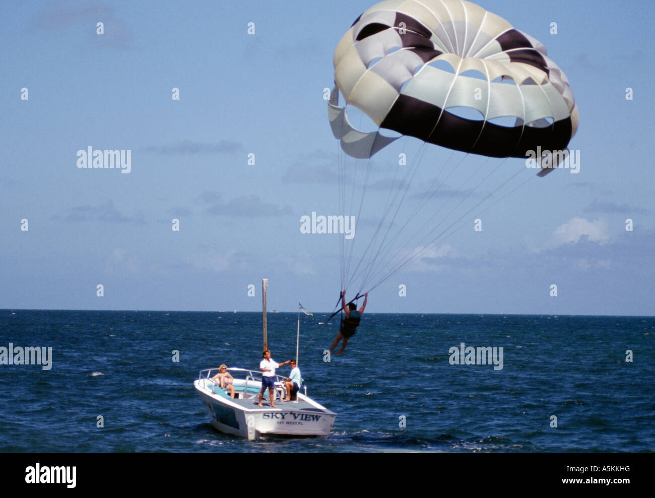 FL Key West parasail and tow boat Stock Photo - Alamy