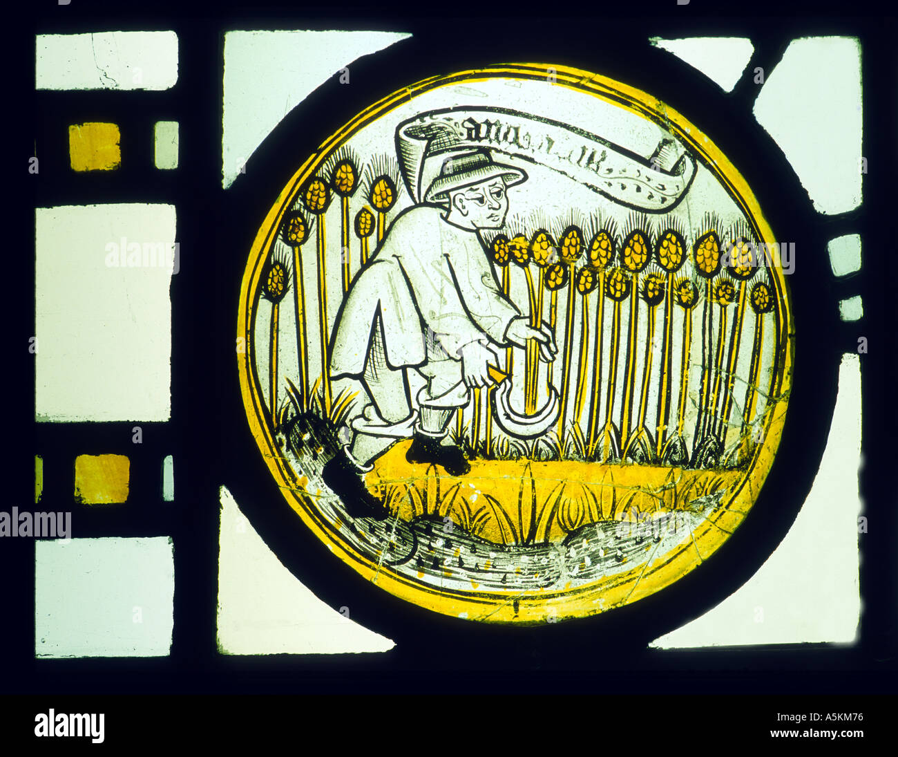 Medieval stained glass roundel labour hi-res stock photography and ...