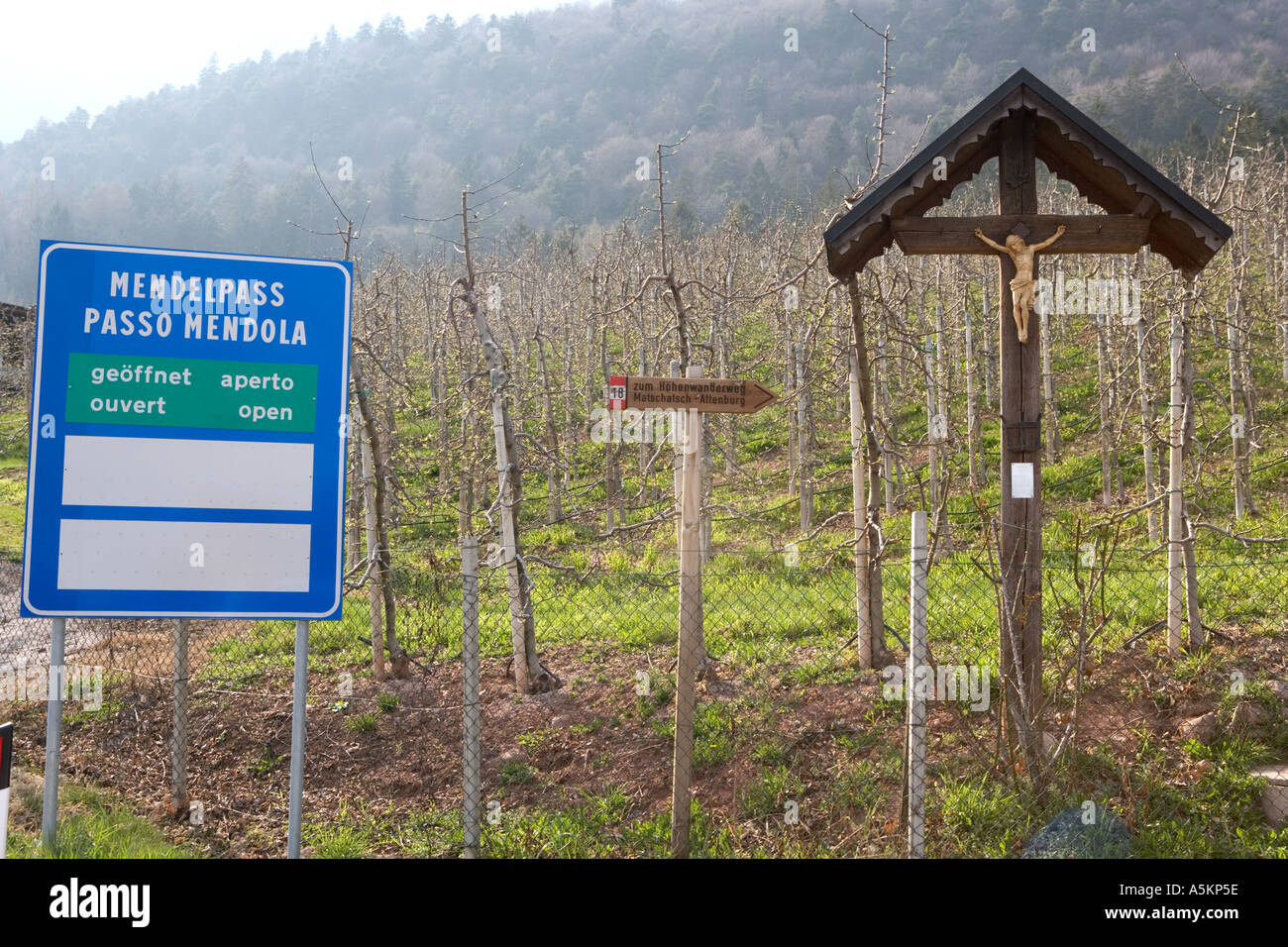 Passo Mendola and roadside crucifix Alto Adige Italy Stock Photo - Alamy