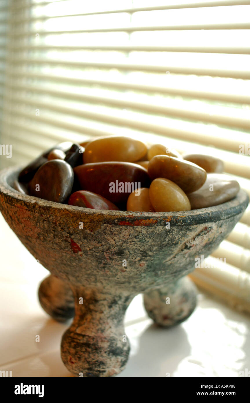 Pebbles in a bowl hi-res stock photography and images - Alamy
