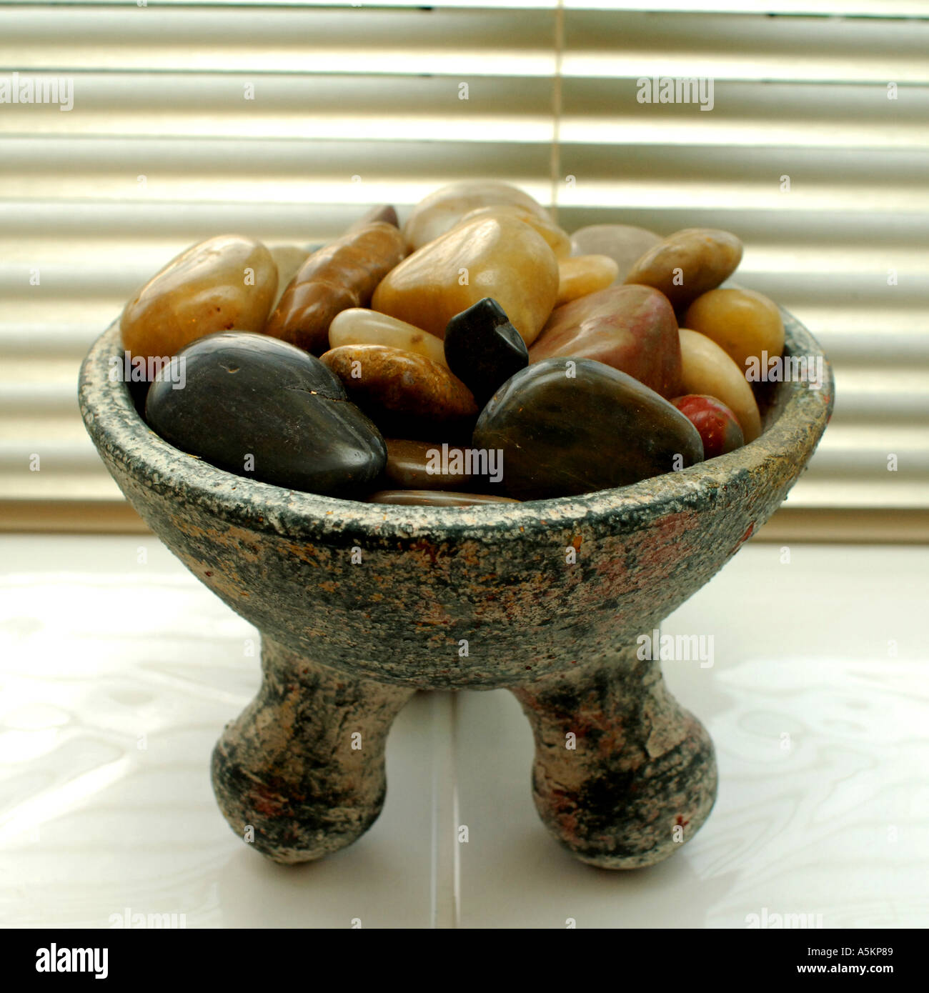 Pebbles in a bowl hi-res stock photography and images - Alamy