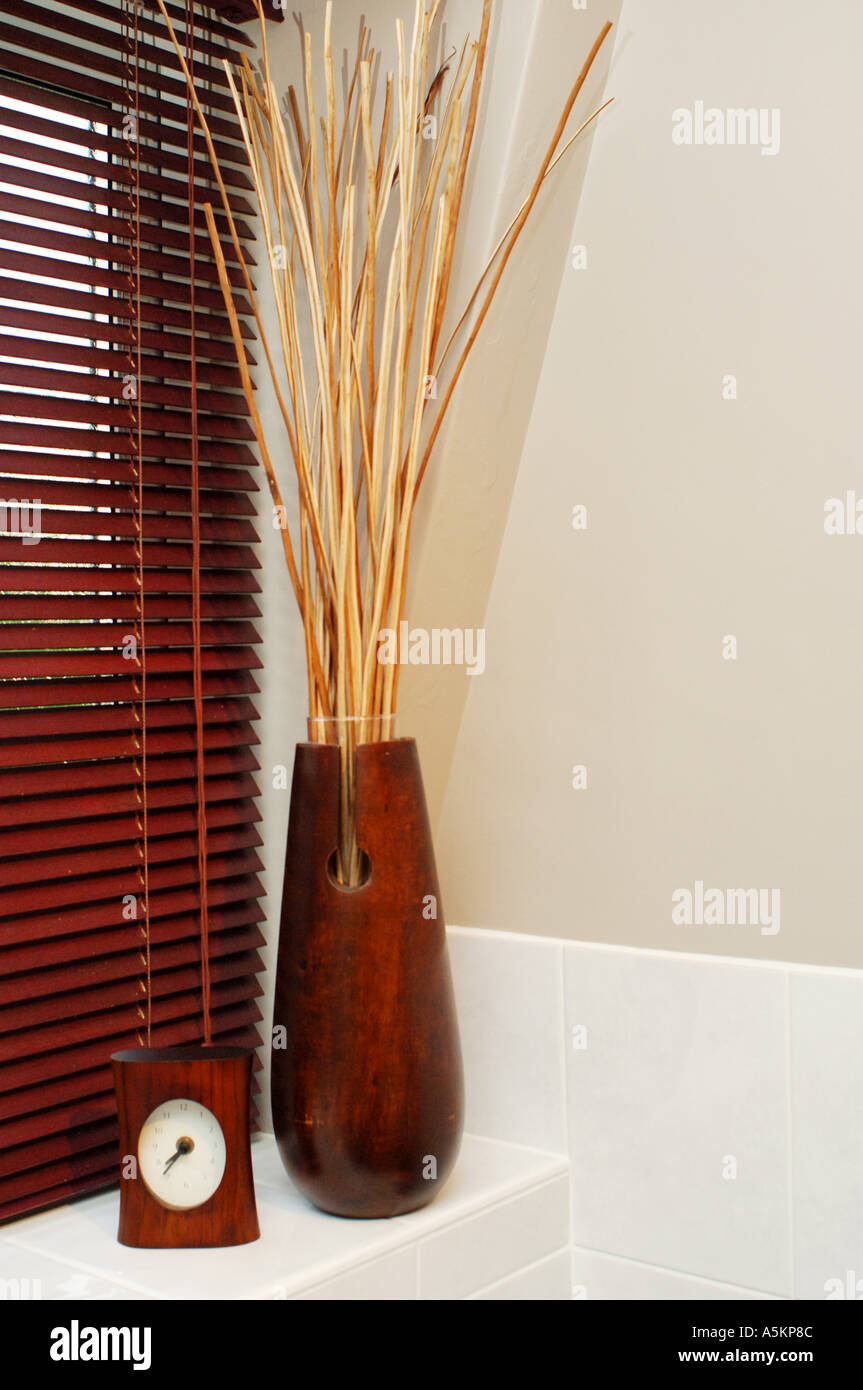 Vase and Clock in a Window Sill Stock Photo - Alamy