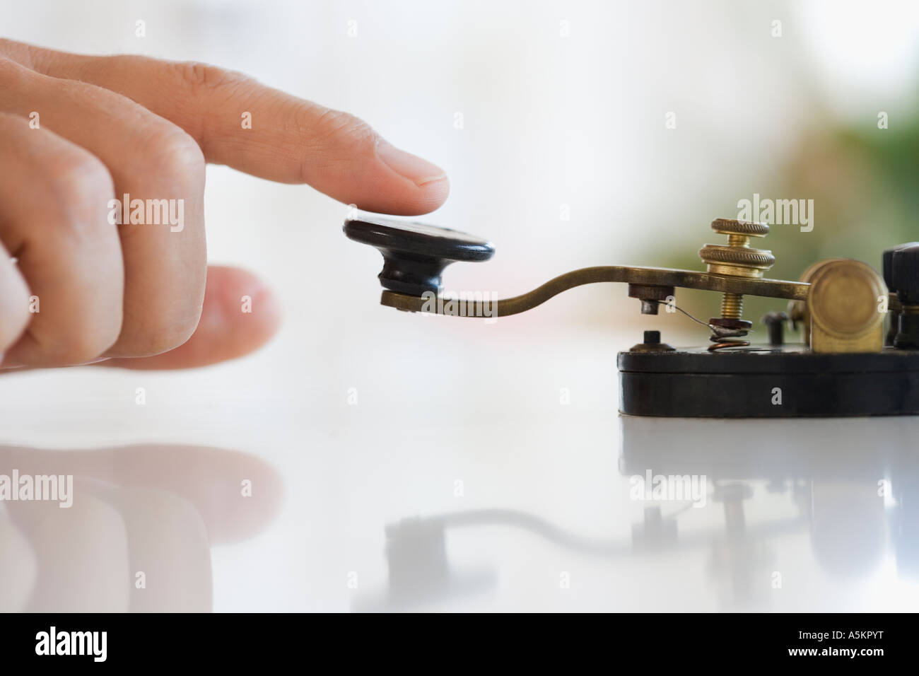 Close up of man using telegraph Stock Photo - Alamy