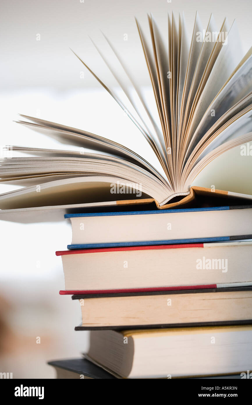Close up of stack of books Stock Photo - Alamy