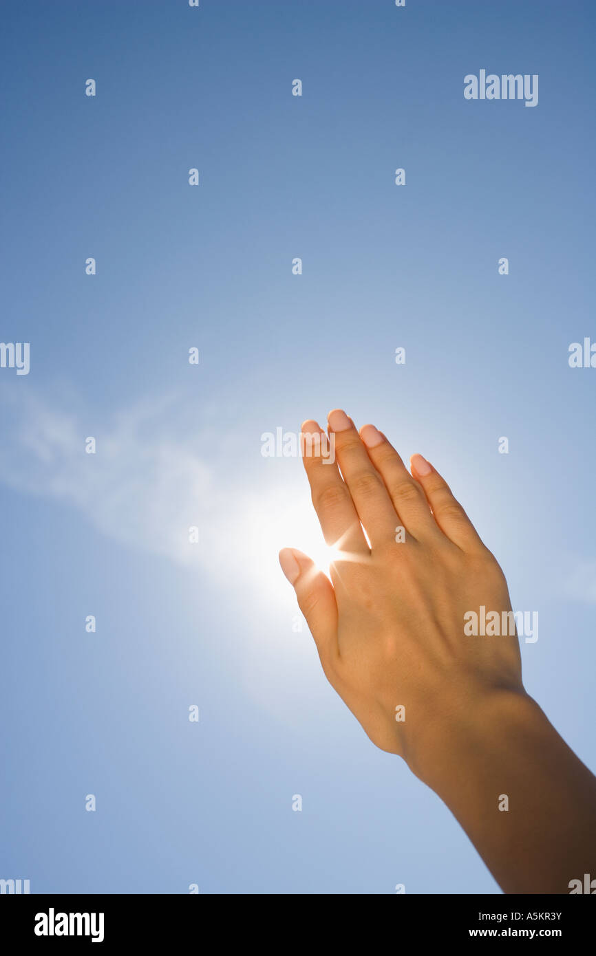 Close up of woman s hand blocking sun Stock Photo - Alamy