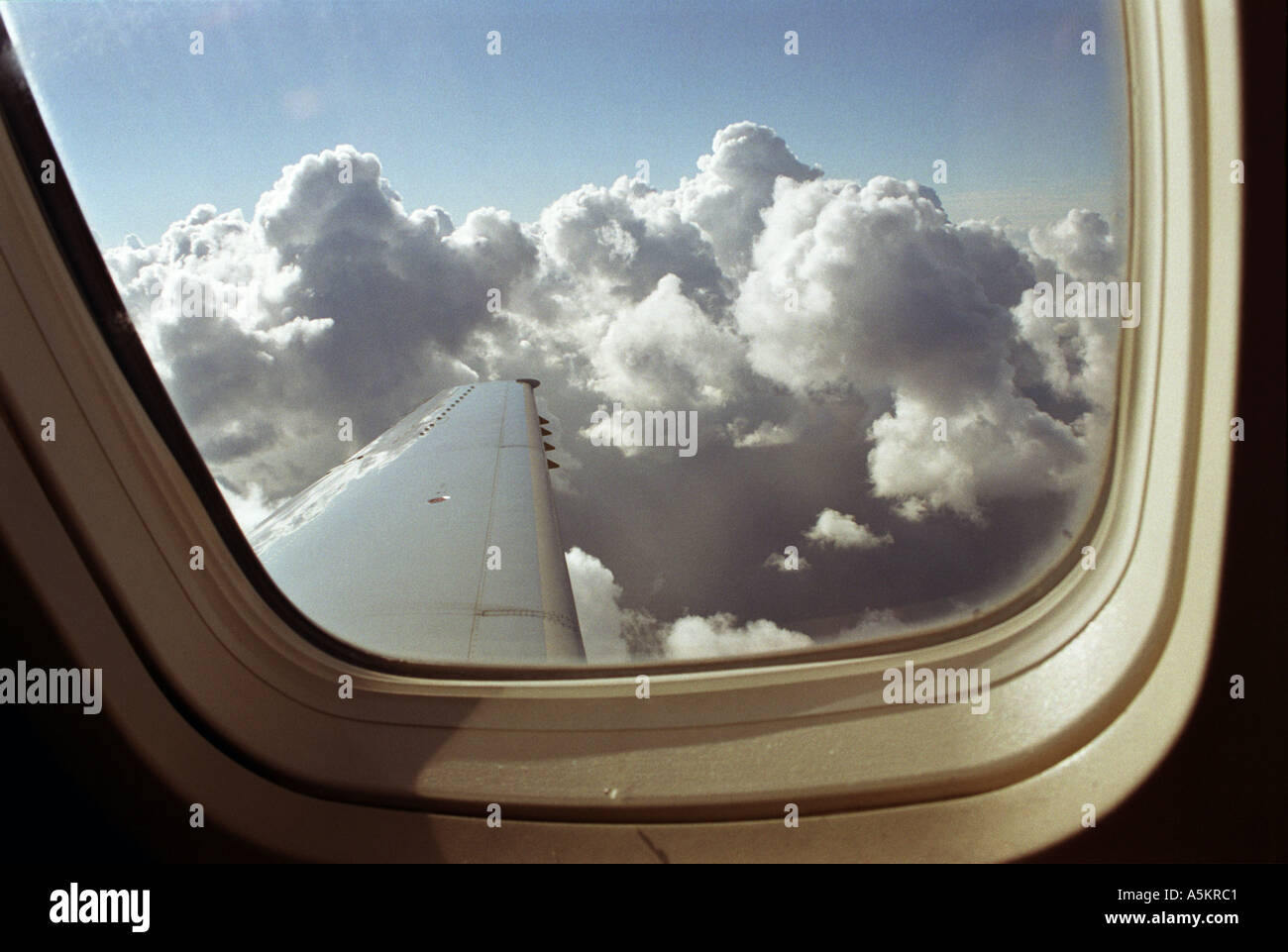 view of wing and dramatic sky from plane window Stock Photo - Alamy