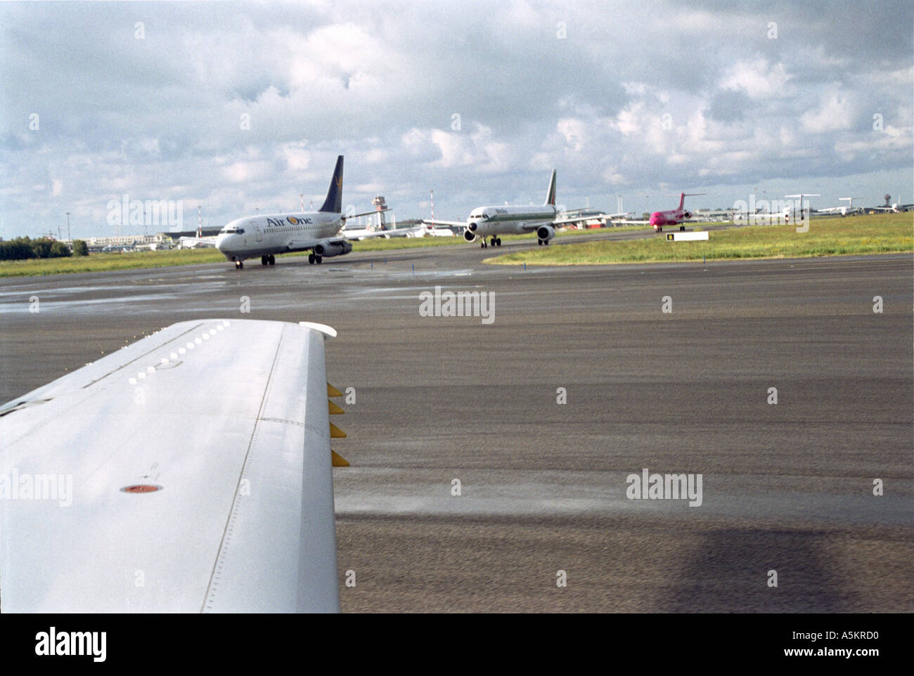 view of planes on ground from plane window Stock Photo - Alamy