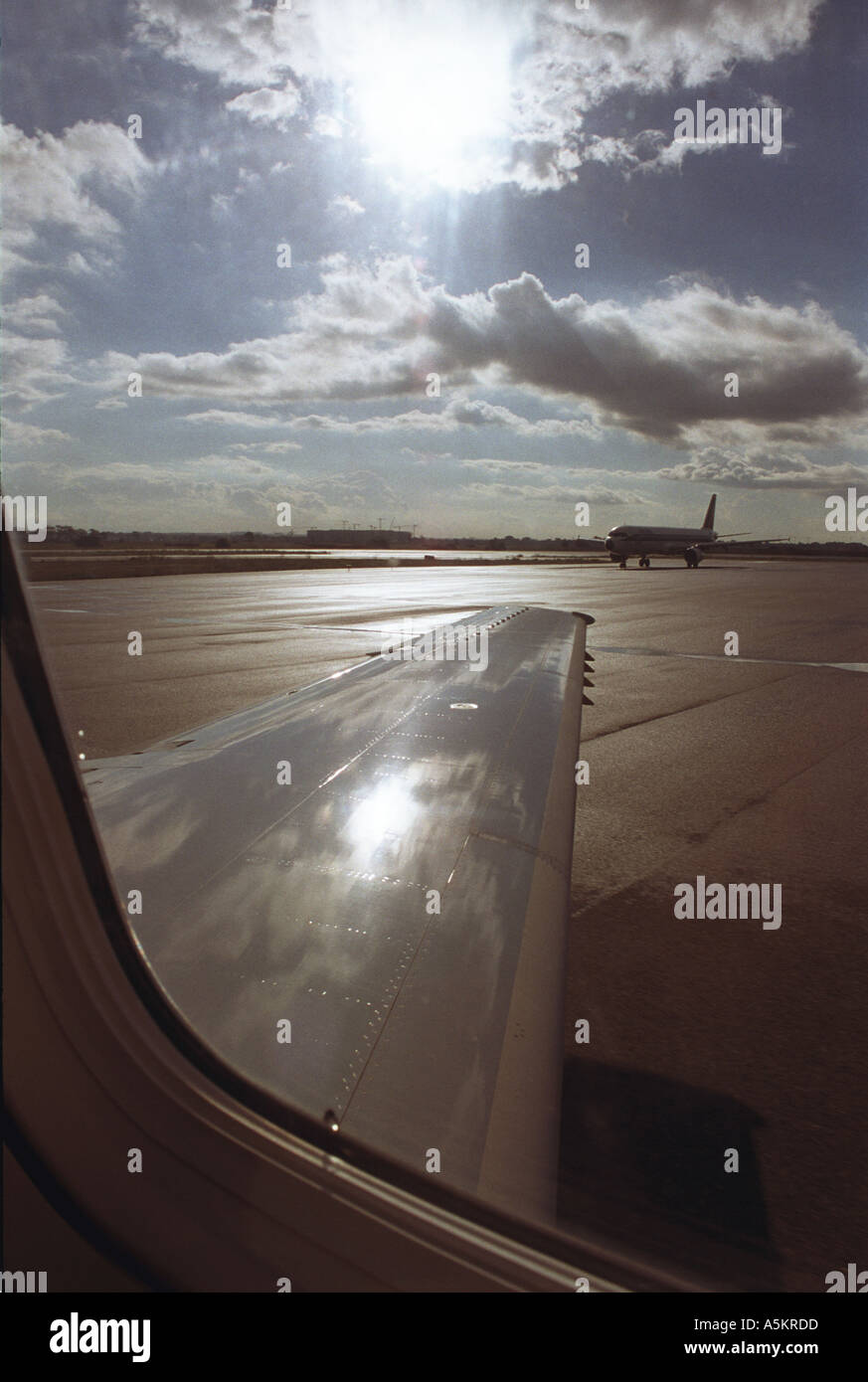 view of planes on ground from plane window Stock Photo - Alamy