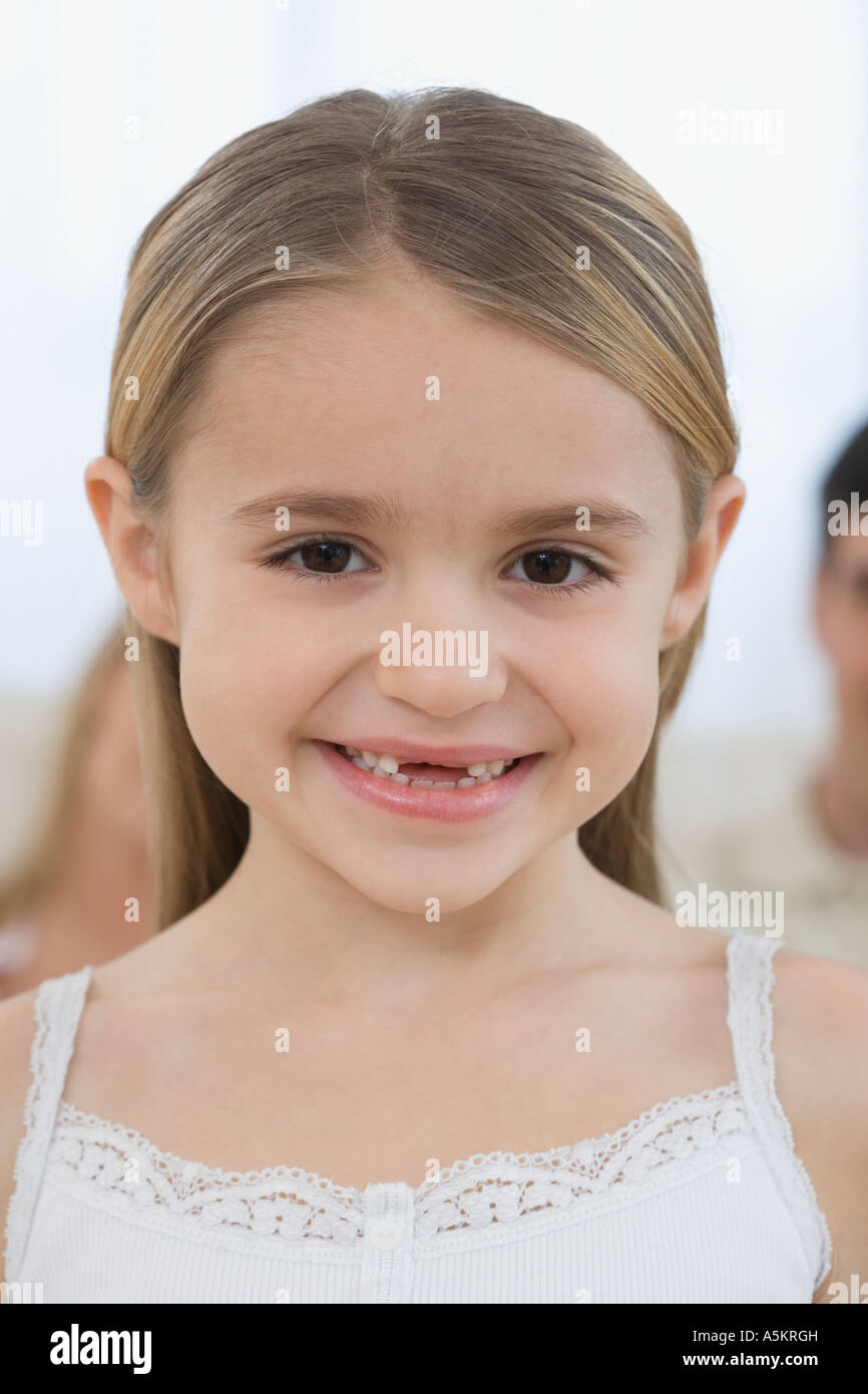 Portrait of girl with missing front teeth Stock Photo - Alamy