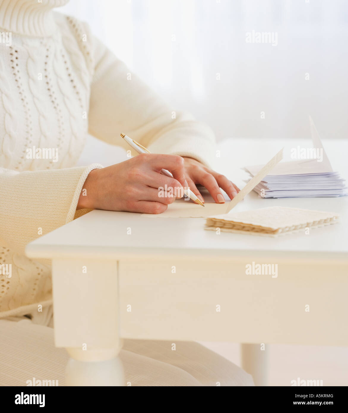 Woman writing cards Stock Photo - Alamy